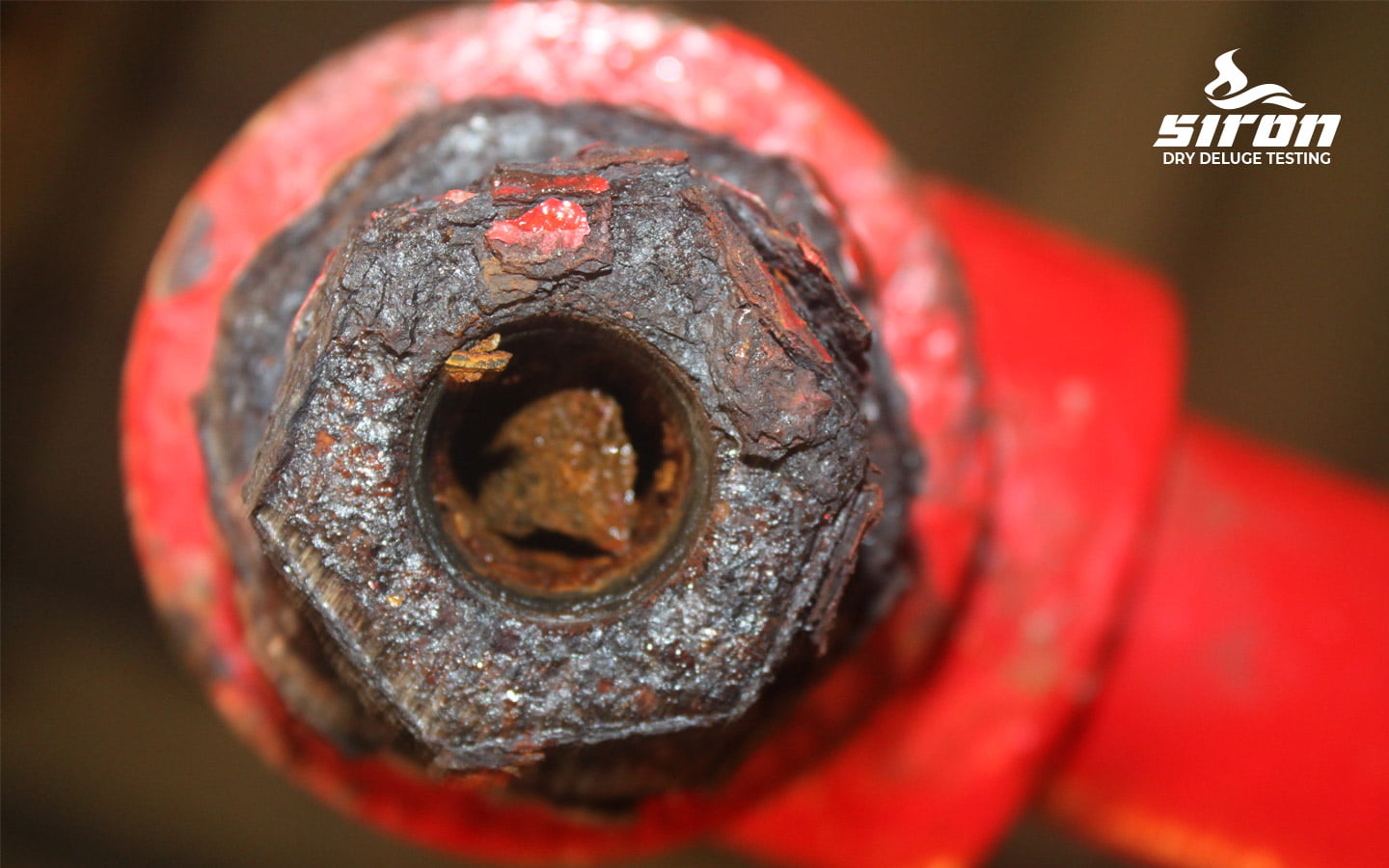 Clogged nozzles shown during inspection with a Dry Deluge Test